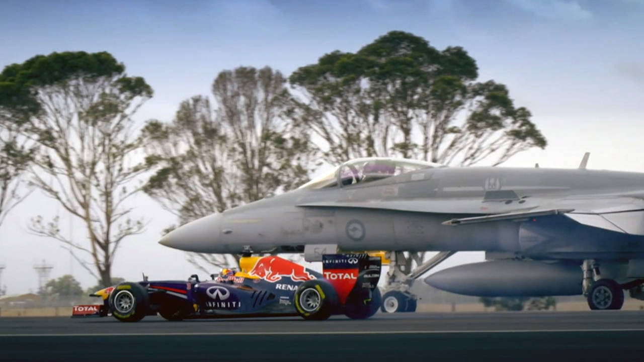 Red Bull F1 Car Races Fighter Jet - Videos